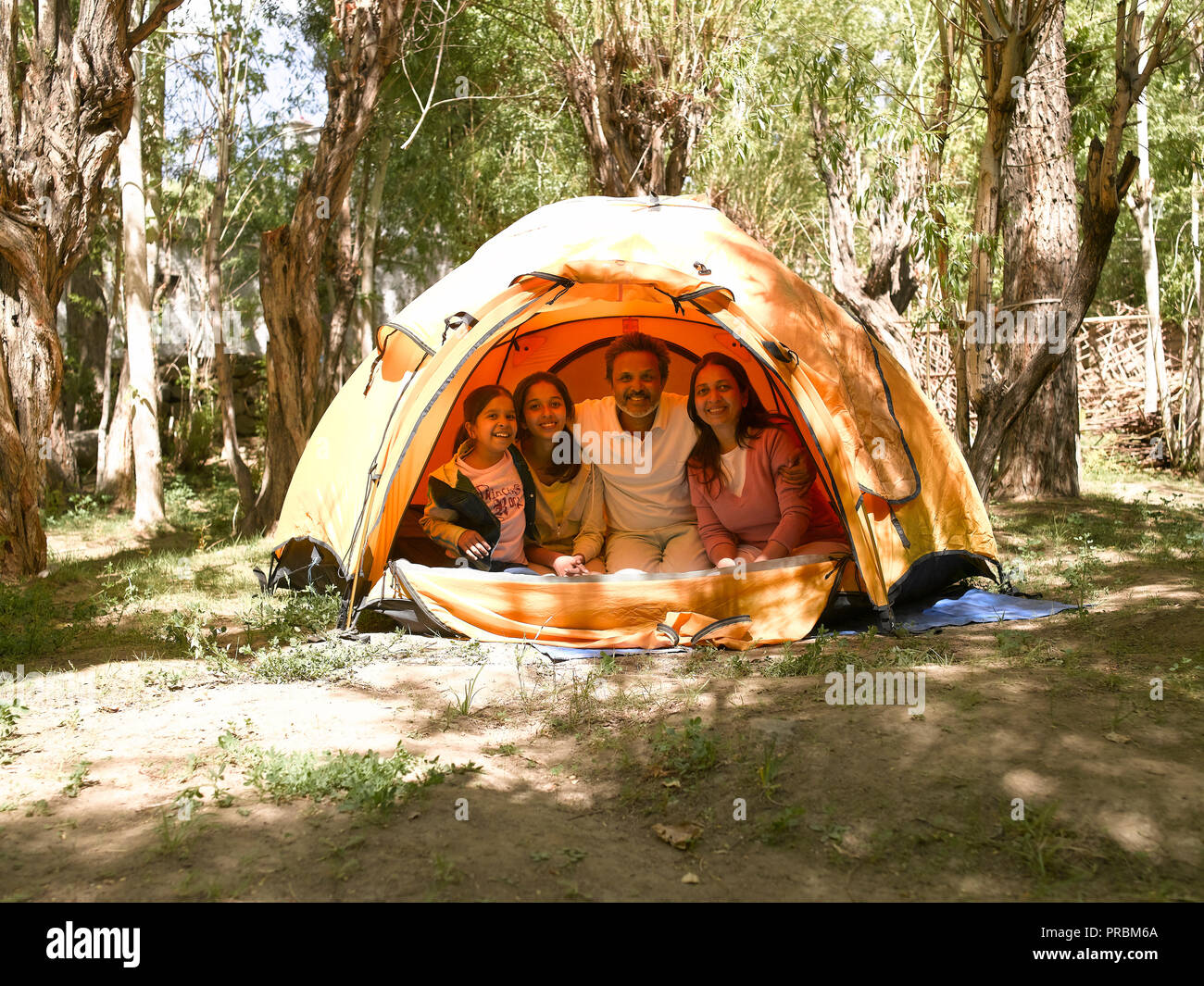 FAMILY OF FOUR IN A TENT, TENTED CAMPSITE, SABOO,LADAKH, JAMMU ...