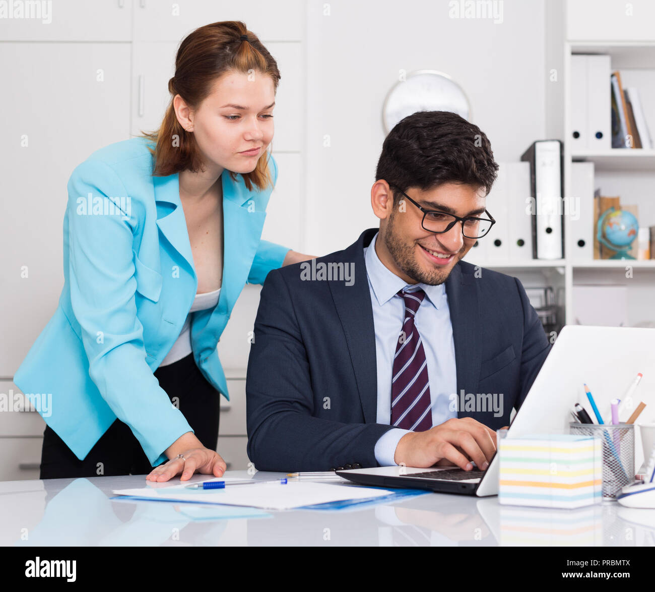 Focused business team working with computer in modern office Stock ...