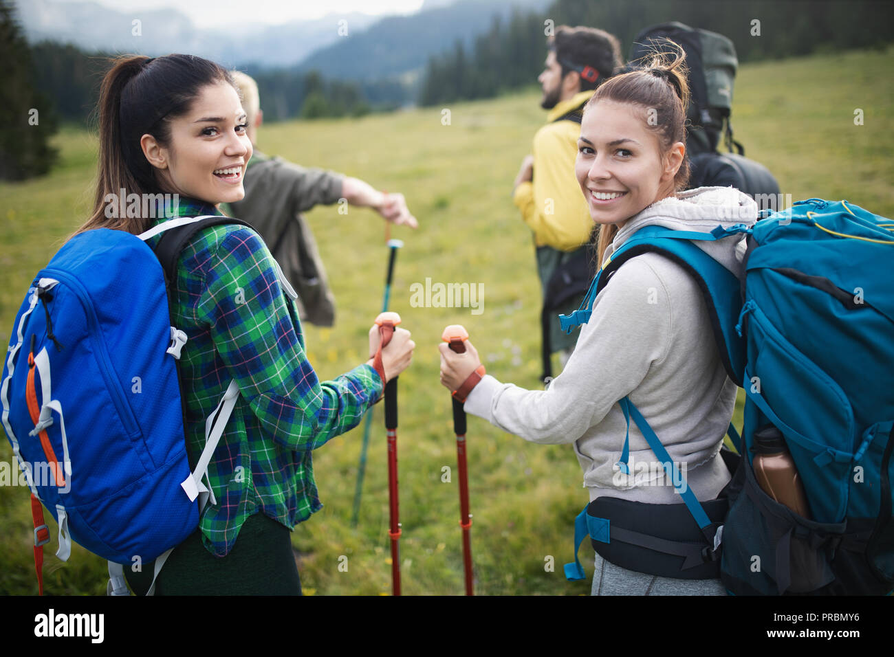 Successful Group of Happy Friends on Mountain Top, Cheering Stock Photo ...
