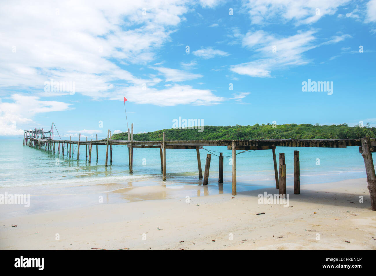 Wooden bridge on beach at the sea with freshness of nature Stock Photo ...