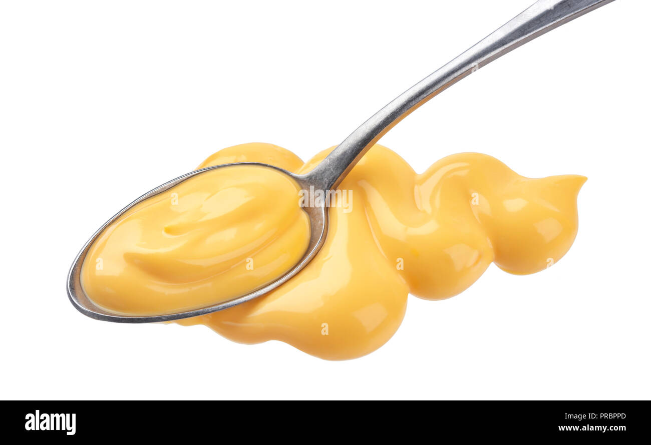 Mayonnaise with spoon isolated on white background with clipping path ...
