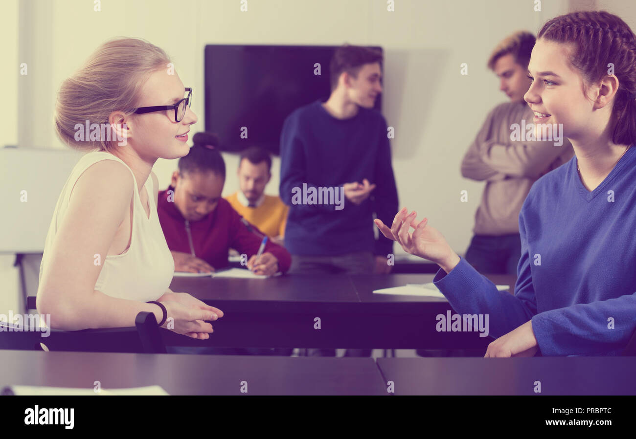 Group having animated conversation hi-res stock photography and images ...