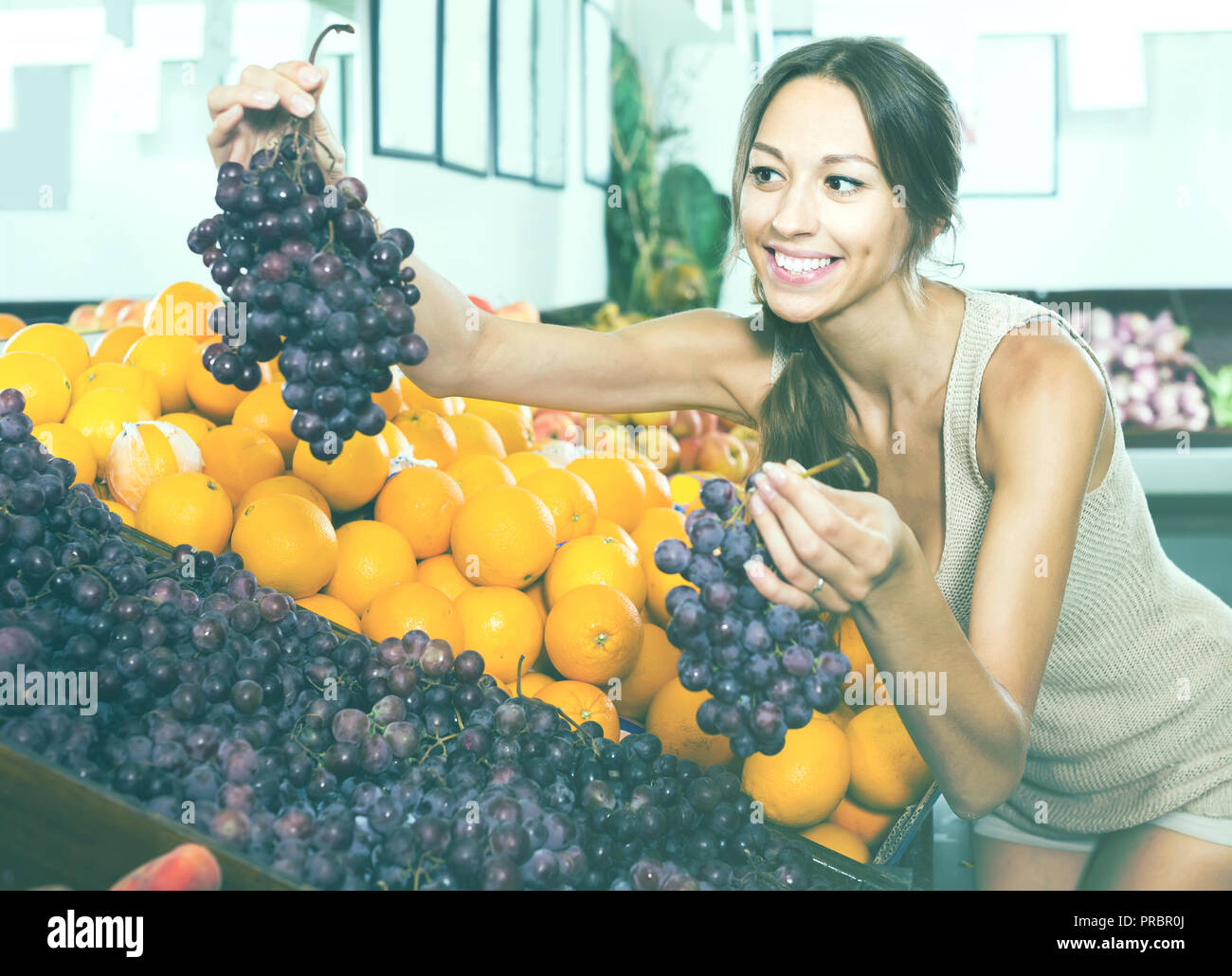 Positive young woman customer hi-res stock photography and images - Alamy