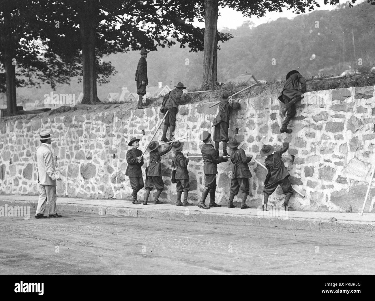 Boy scouts climb wall hi-res stock photography and images - Alamy