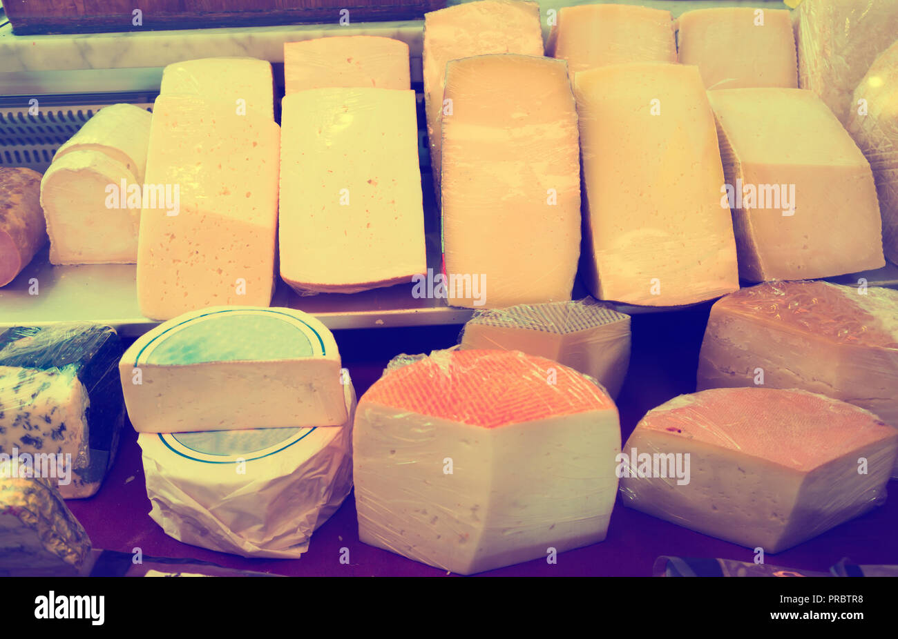Cheese collection in grocery, close up shot Stock Photo - Alamy