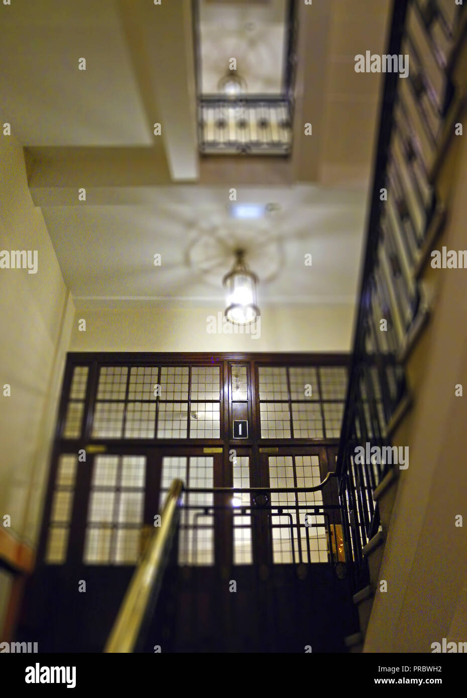 Dark staircase in an apartment building Stock Photo - Alamy