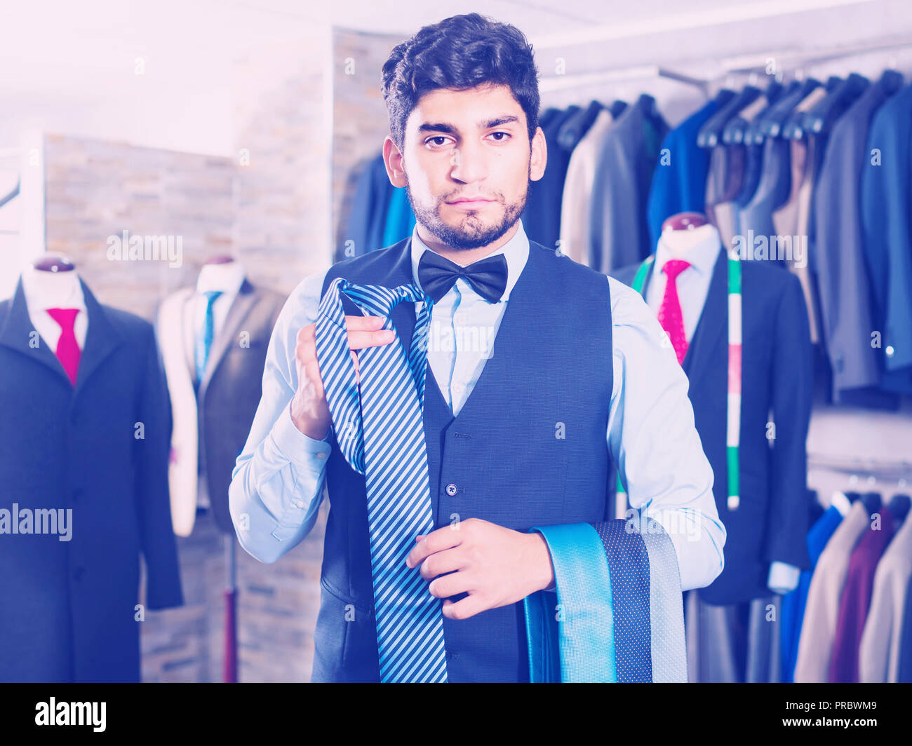 Guy picking up shop hi-res stock photography and images - Alamy