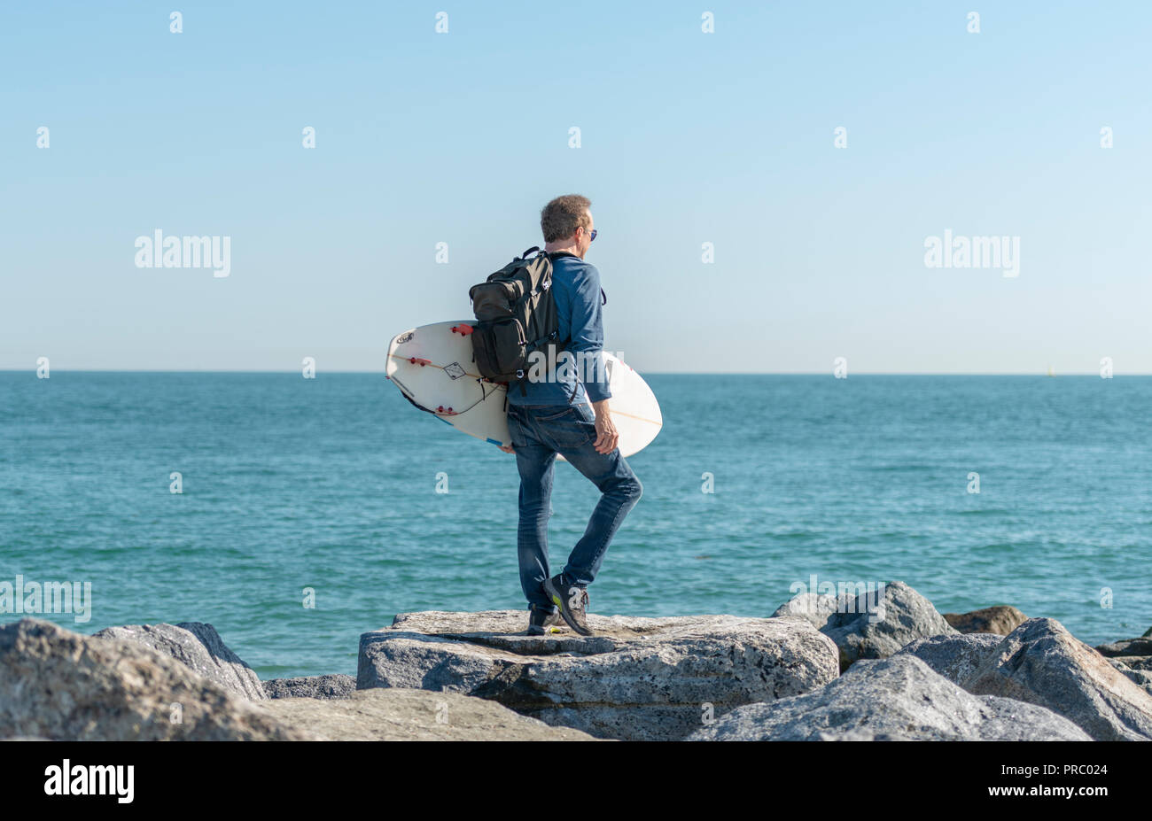 Man carrying rock hi-res stock photography and images - Alamy