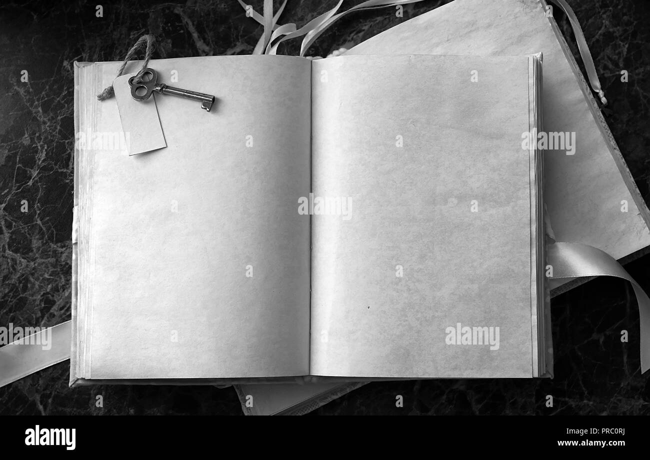 Green table with book Black and White Stock Photos & Images - Alamy