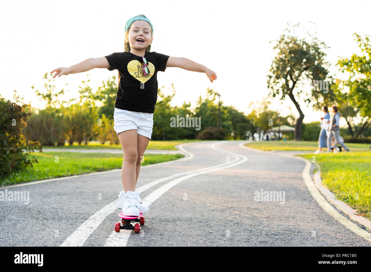 Toddler playing on skate park hi-res stock photography and images - Alamy