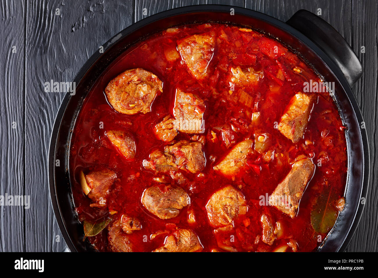 hearty Red Chile and Pork Stew or Carne Adobada in a dutch oven on a ...