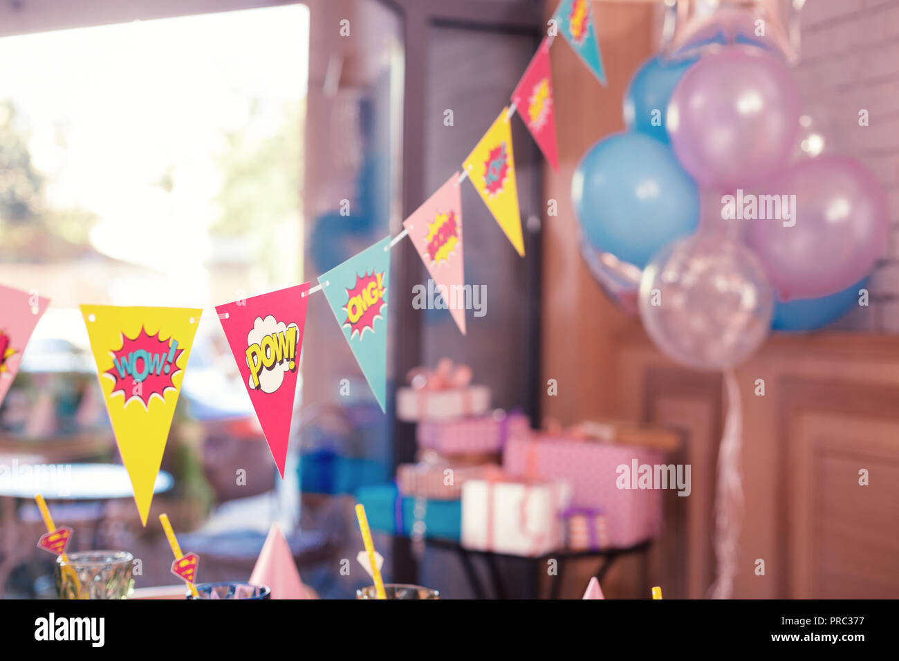 Beautiful photo of colorful party flags placed in the room Stock Photo ...