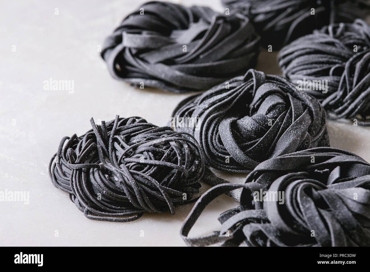 Black uncooked spaghetti cuttlefish ink hi-res stock photography and ...