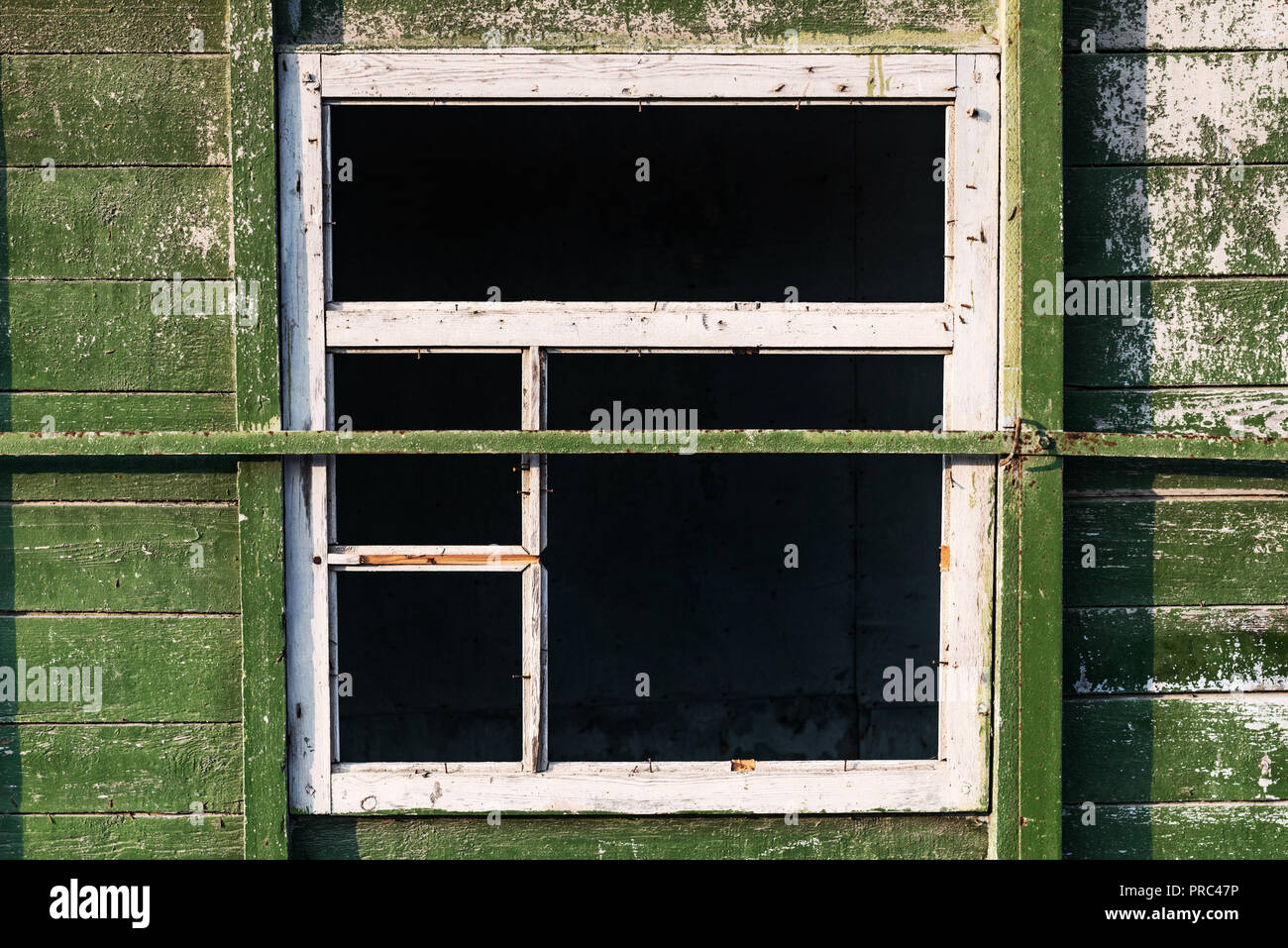 Window of an abandoned wooden house Stock Photo - Alamy