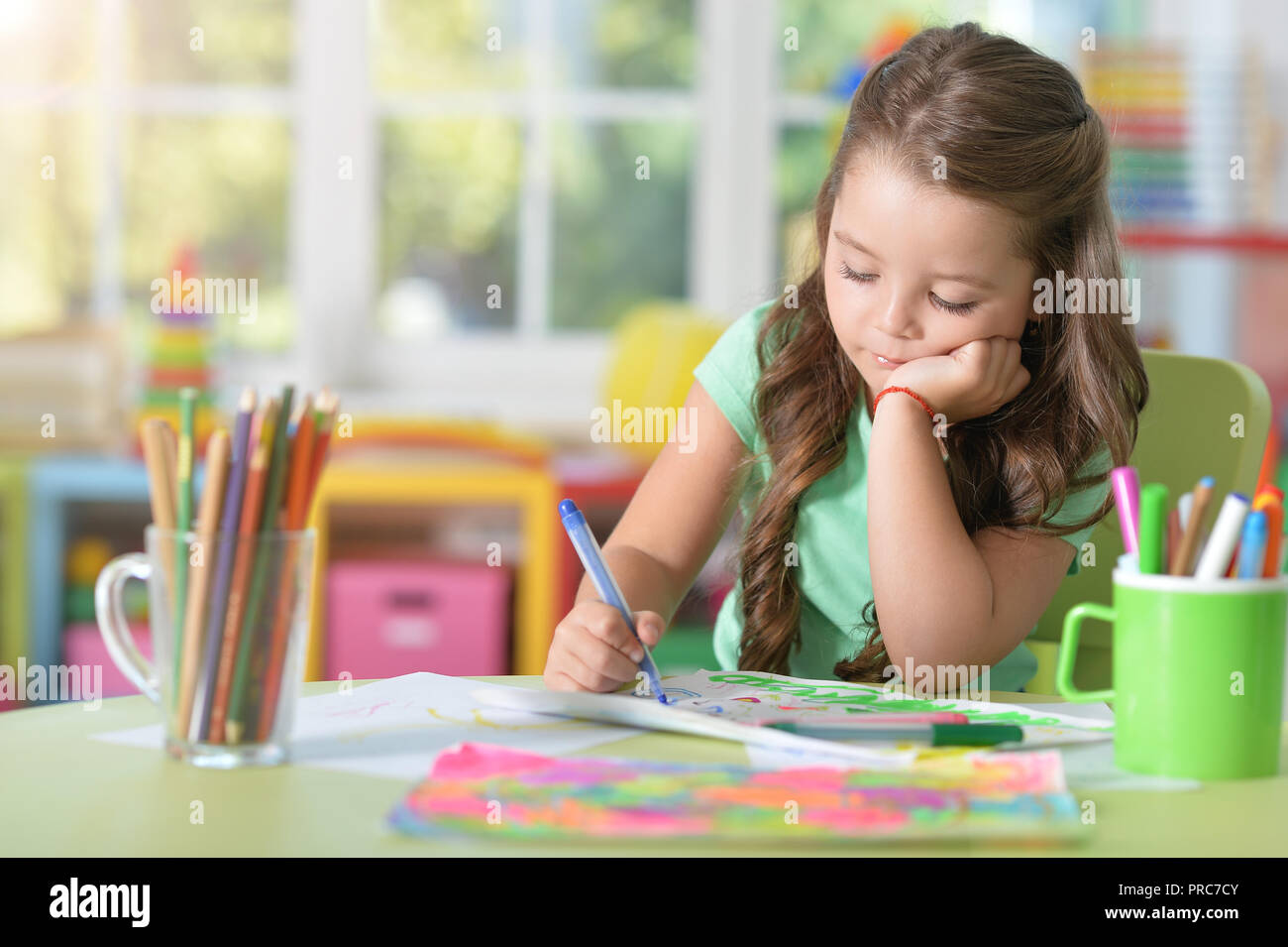 Portrait of happy student girl drawing at home Stock Photo - Alamy