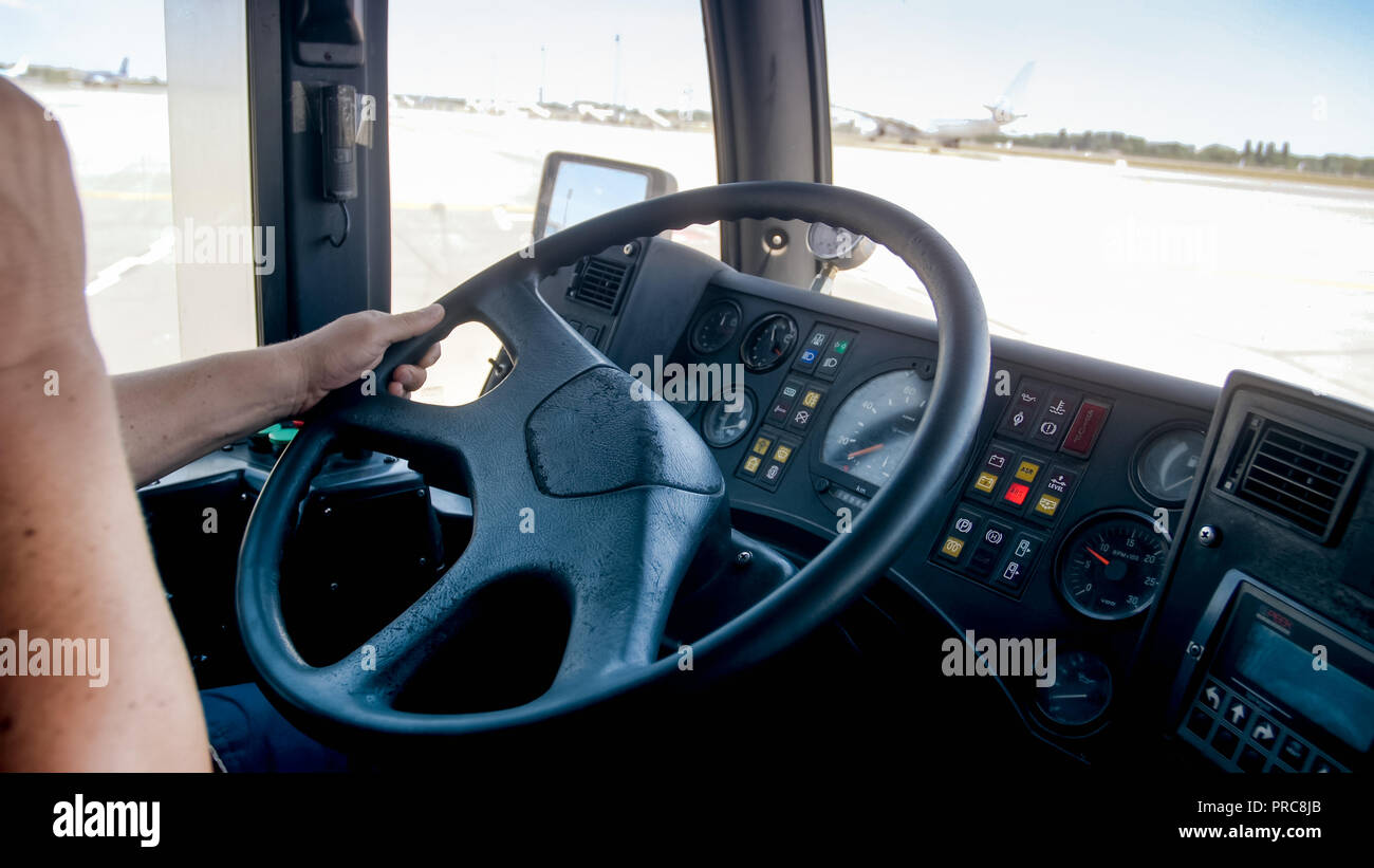 View from cockpit of passenger bus driving on airport runway Stock ...