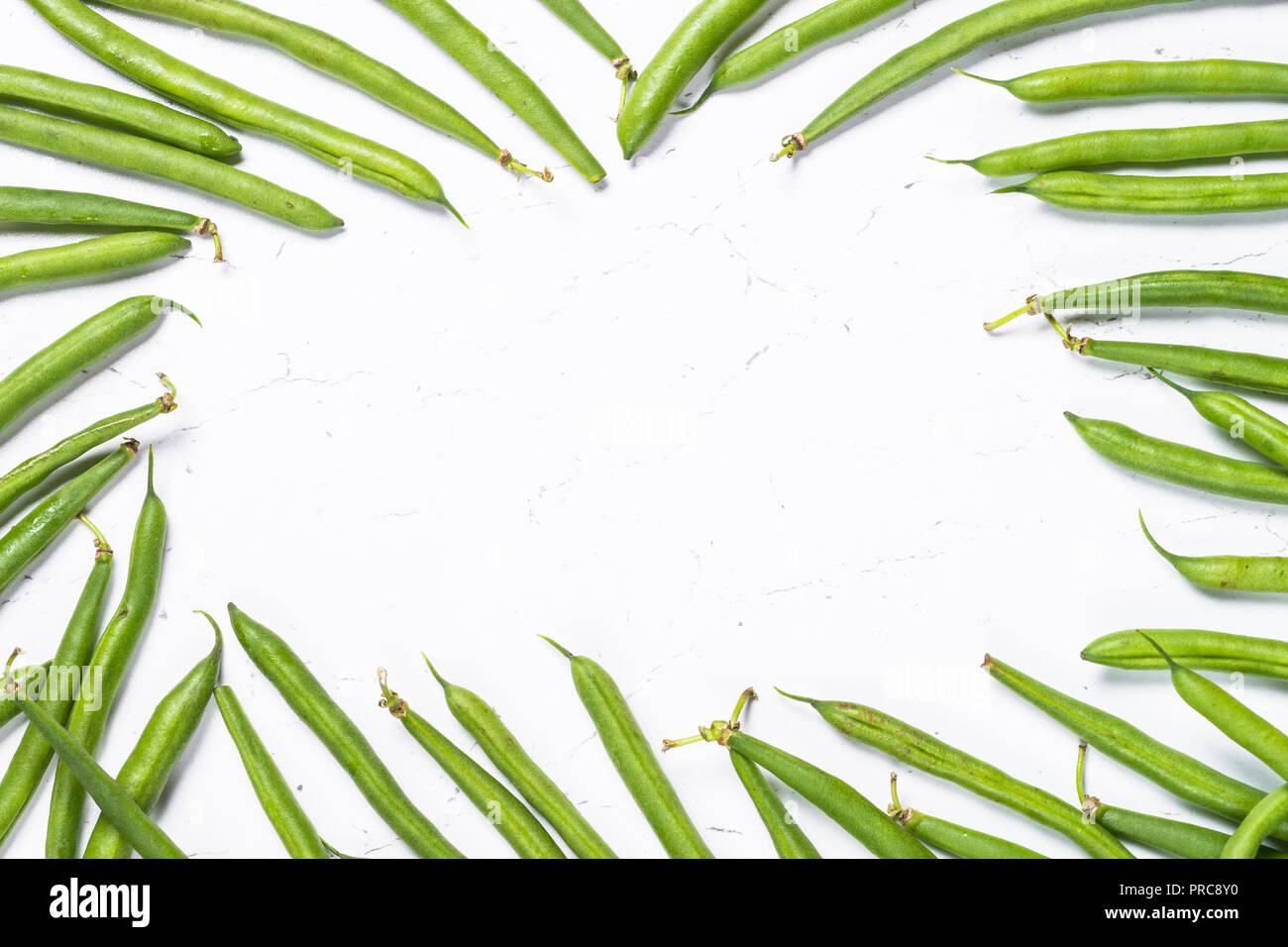 Green beans frame on white background Stock Photo - Alamy