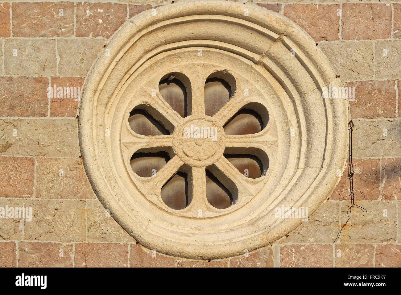 Round Rose Window at Medieval Church Exterior Stock Photo - Alamy