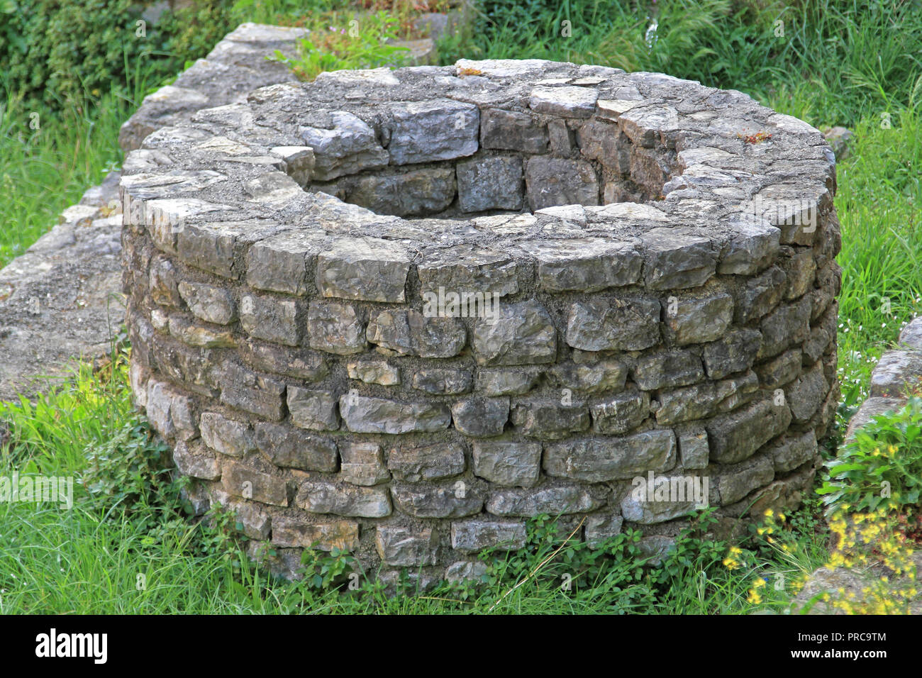 Very Old Round Stone Ground Water Well Stock Photo - Alamy