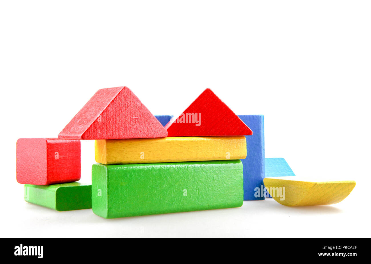 Wooden building blocks isolated on white background Stock Photo - Alamy