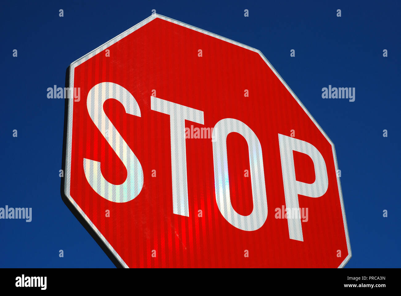stop sign over blue background Stock Photo - Alamy