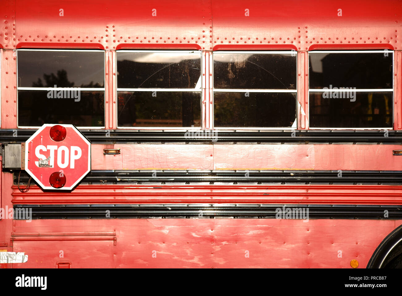 The side view on the body of a discarded school bus Stock Photo - Alamy