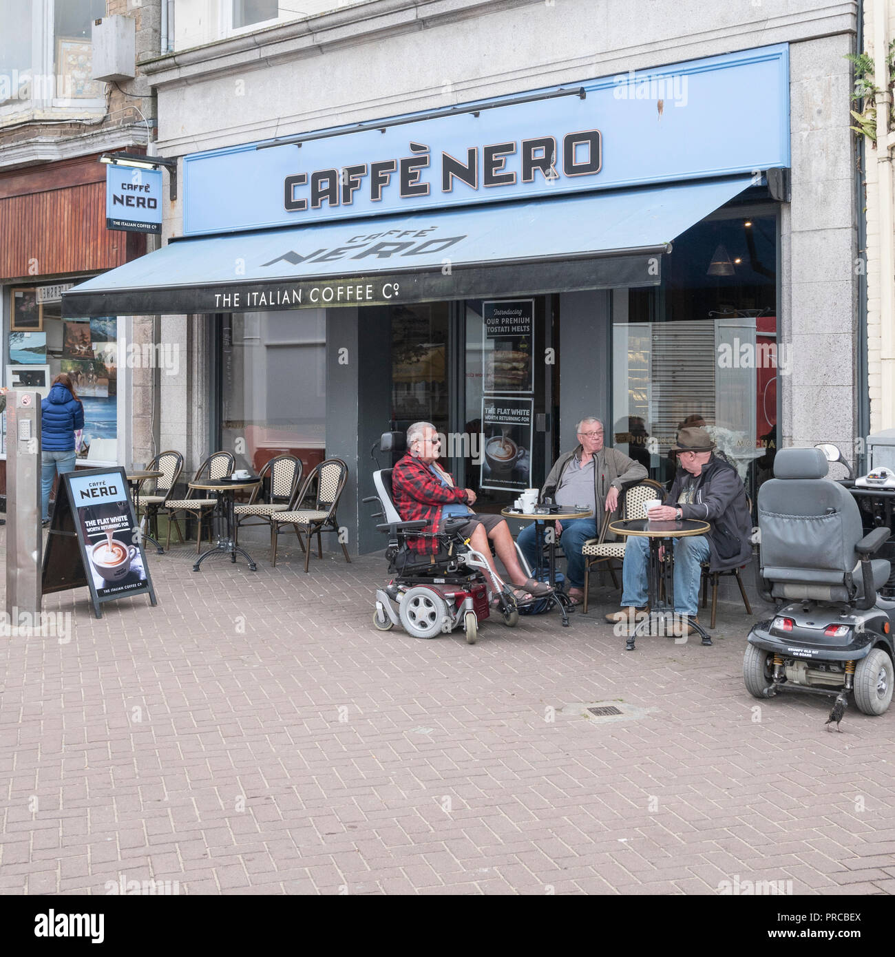 Scenes from around Newquay town centre, Cornwall. Cafe Nero shop in ...