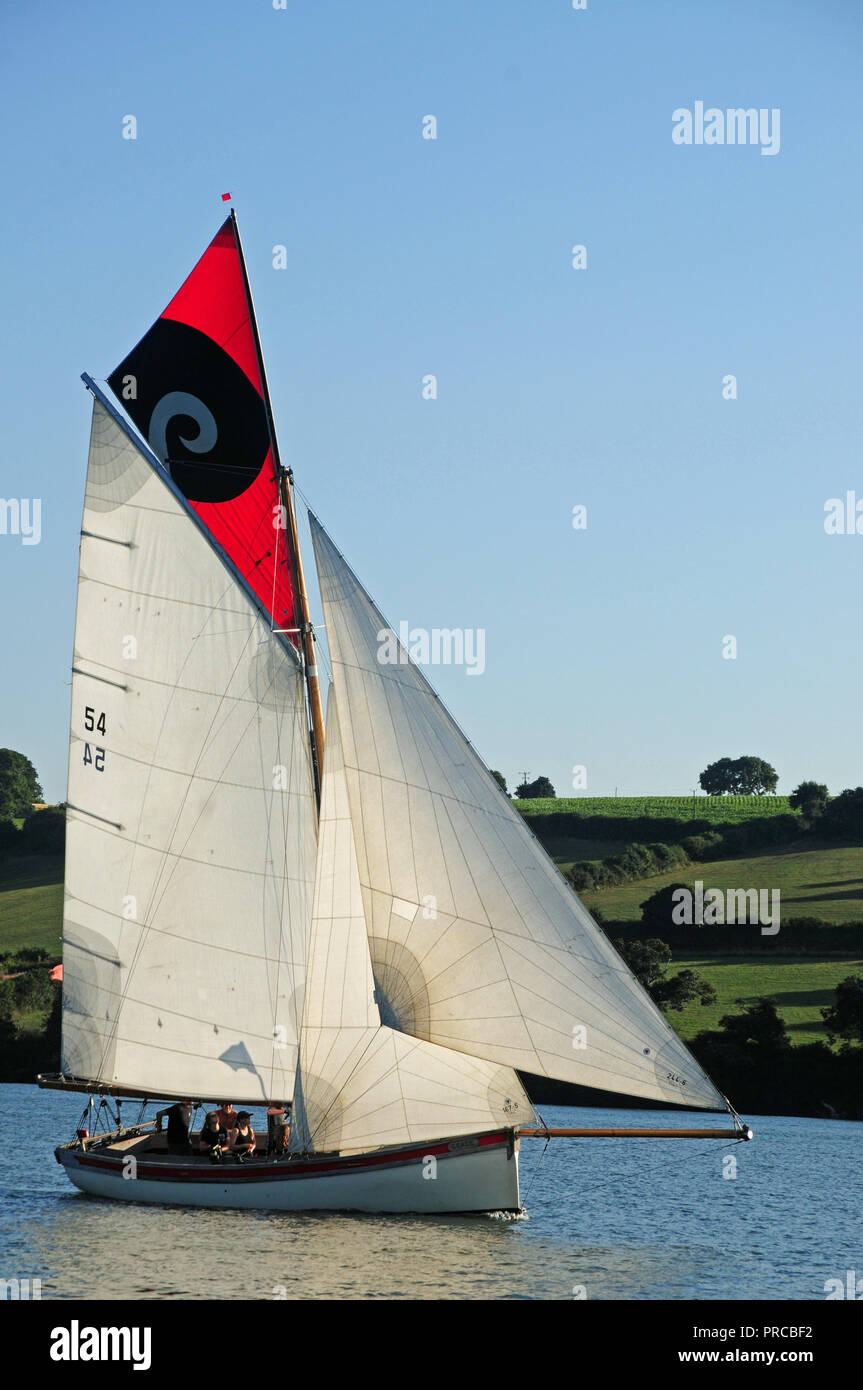 Traditional Falmouth working boat under sail in the Fal estuary Stock ...