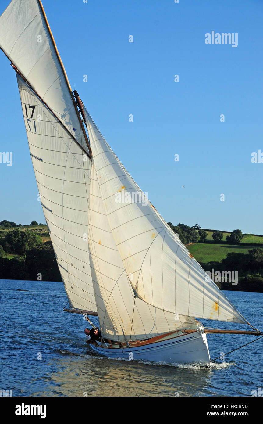 Traditional Falmouth working boat under sail in the Fal estuary Stock ...