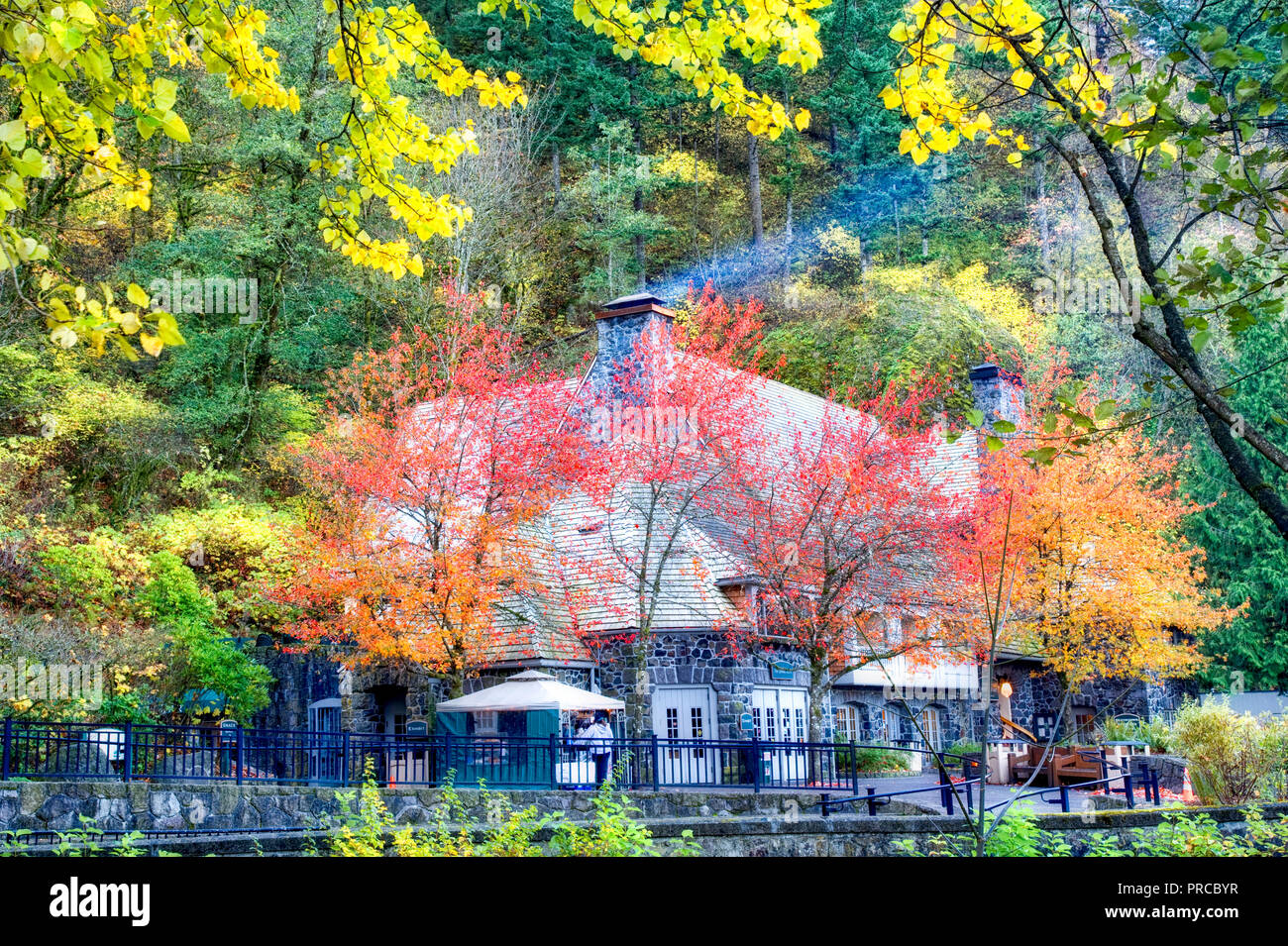 Multnomah Falls Lodge in fall with chimney smoke. Columbia River Gorge ...