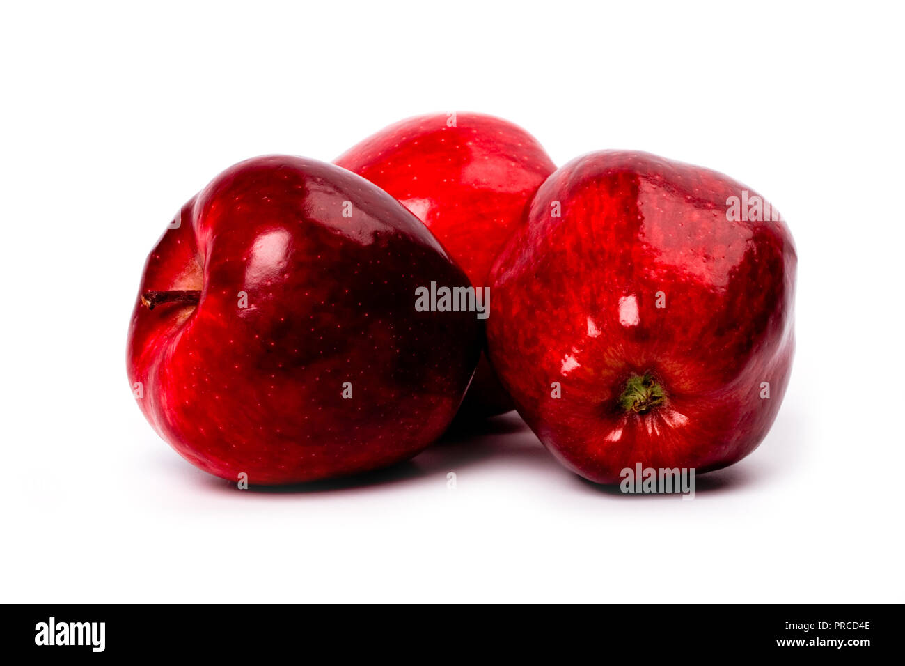 three red apples isolated on white background Stock Photo - Alamy