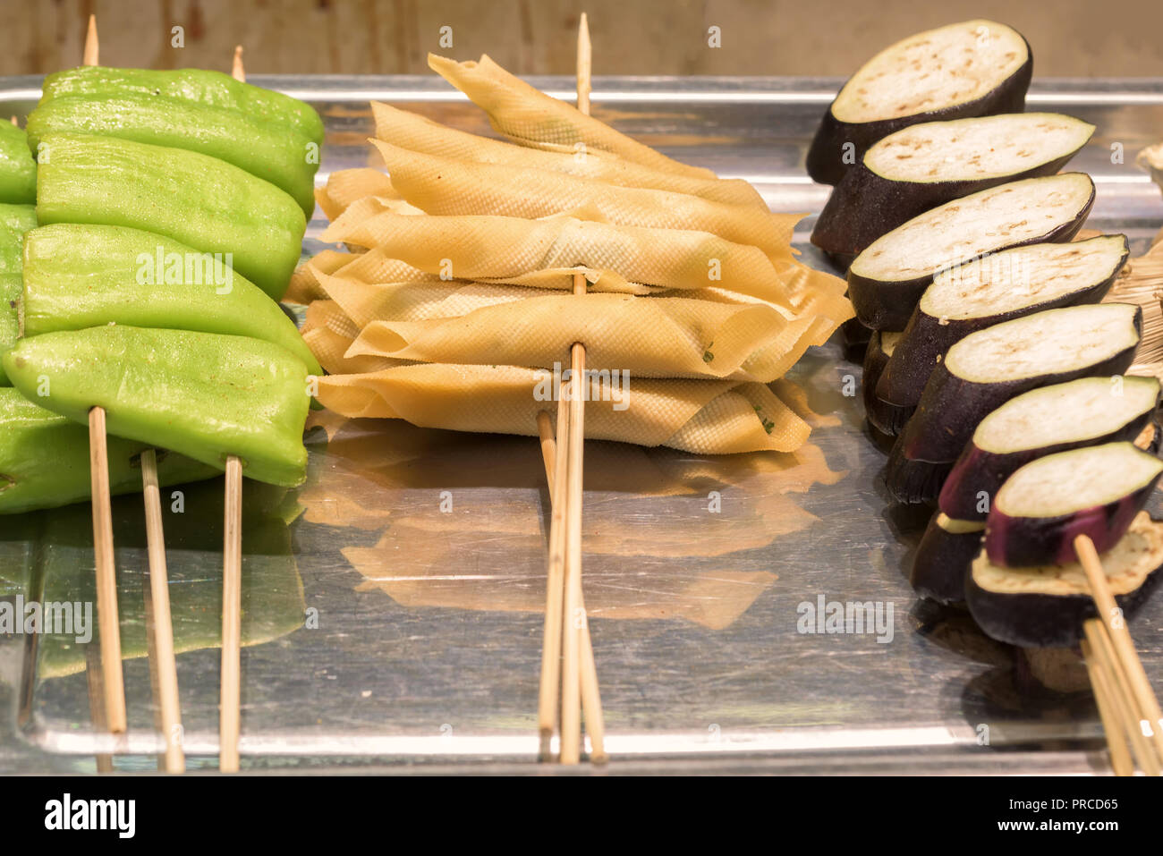 Street food asia. Street food on a stick Stock Photo - Alamy