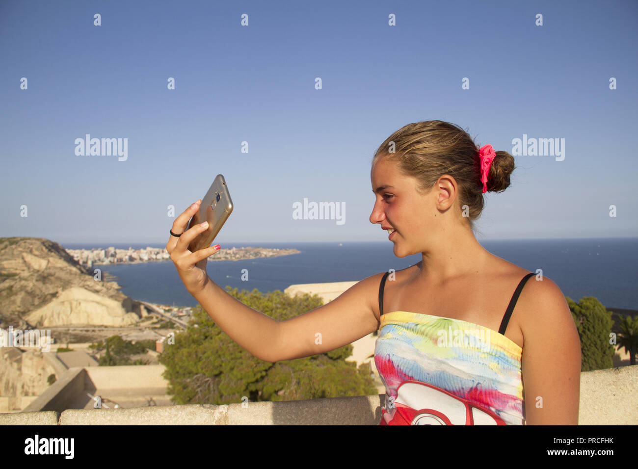 girl making selfie in alicante spain Stock Photo - Alamy