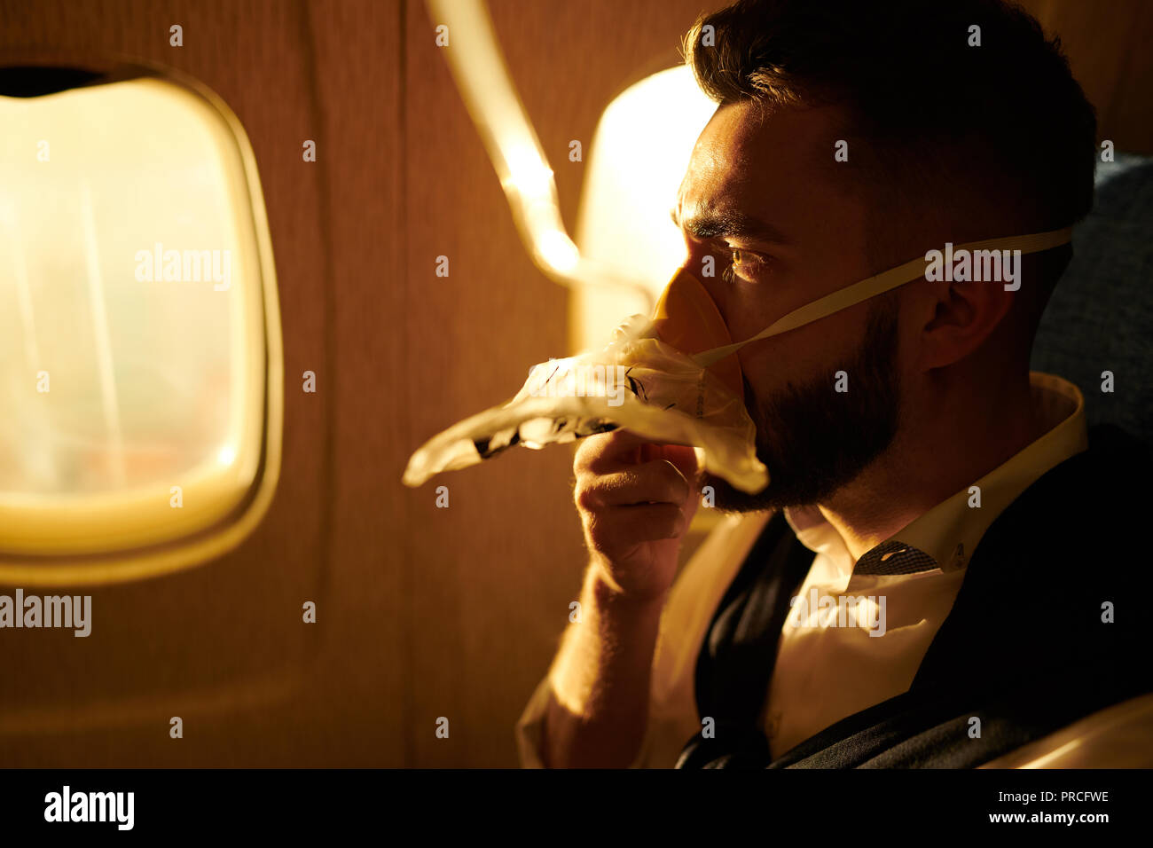 Airplane oxygen mask hi-res stock photography and images - Alamy