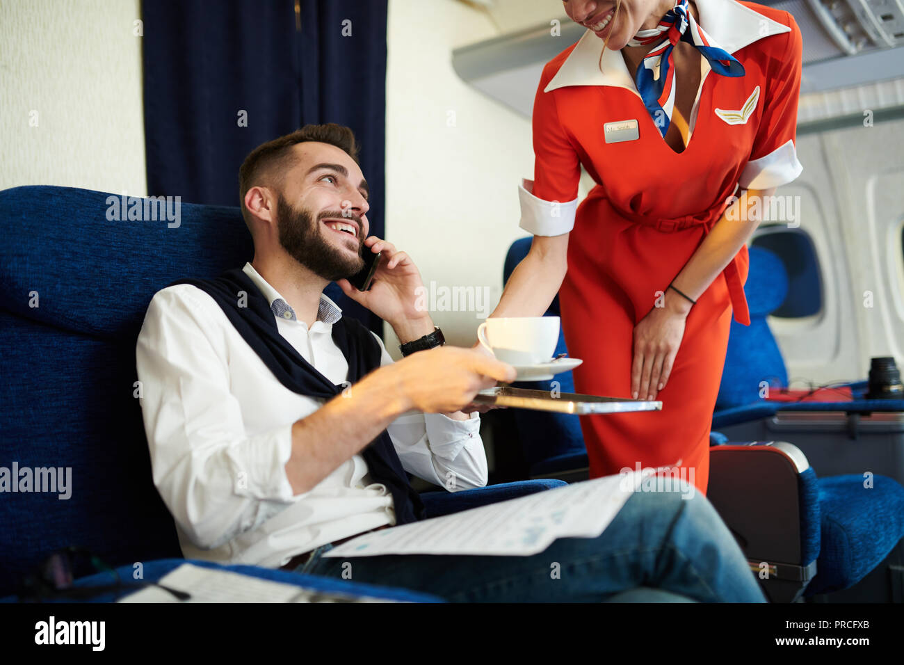 First class flight female hi-res stock photography and images - Alamy