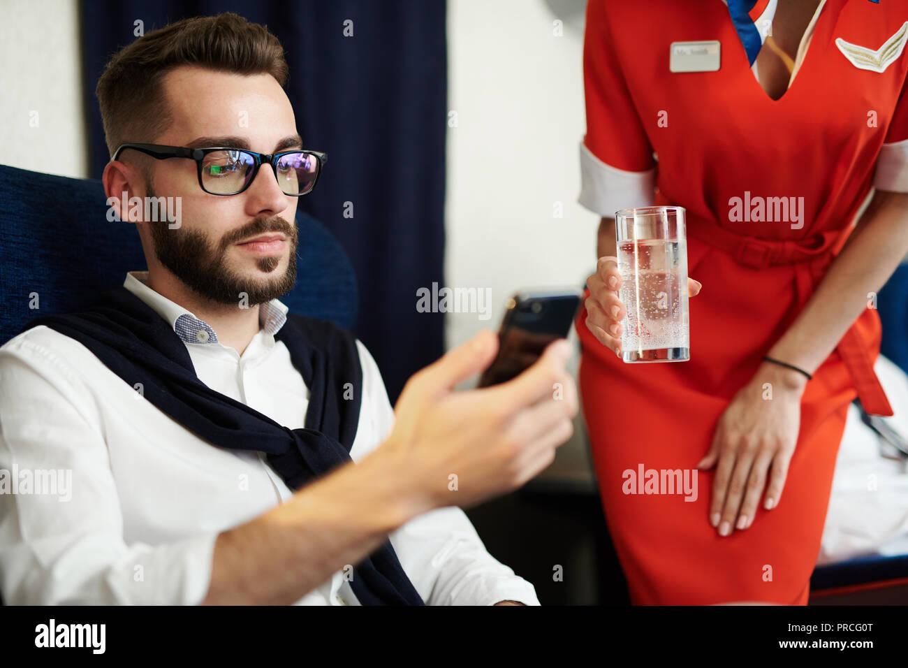 Passenger in First Class Stock Photo - Alamy