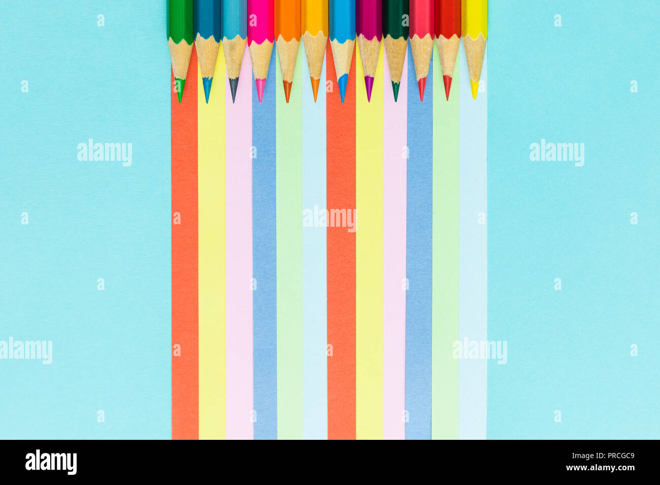 colored pencils and rainbow colorful stripes, stationary Stock Photo ...