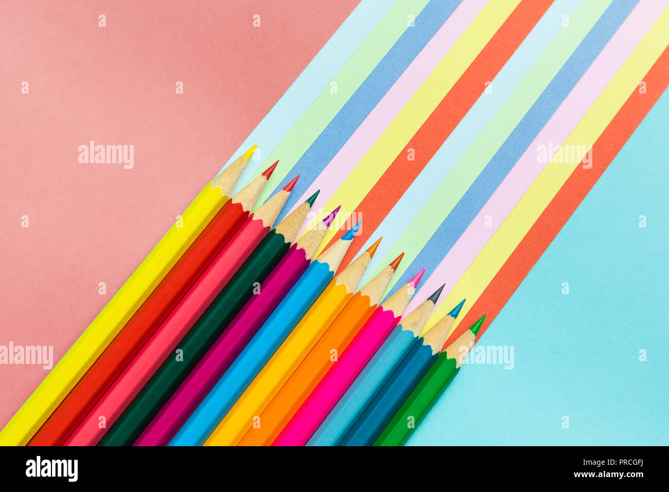 colored pencils and rainbow colorful stripes, stationary Stock Photo ...