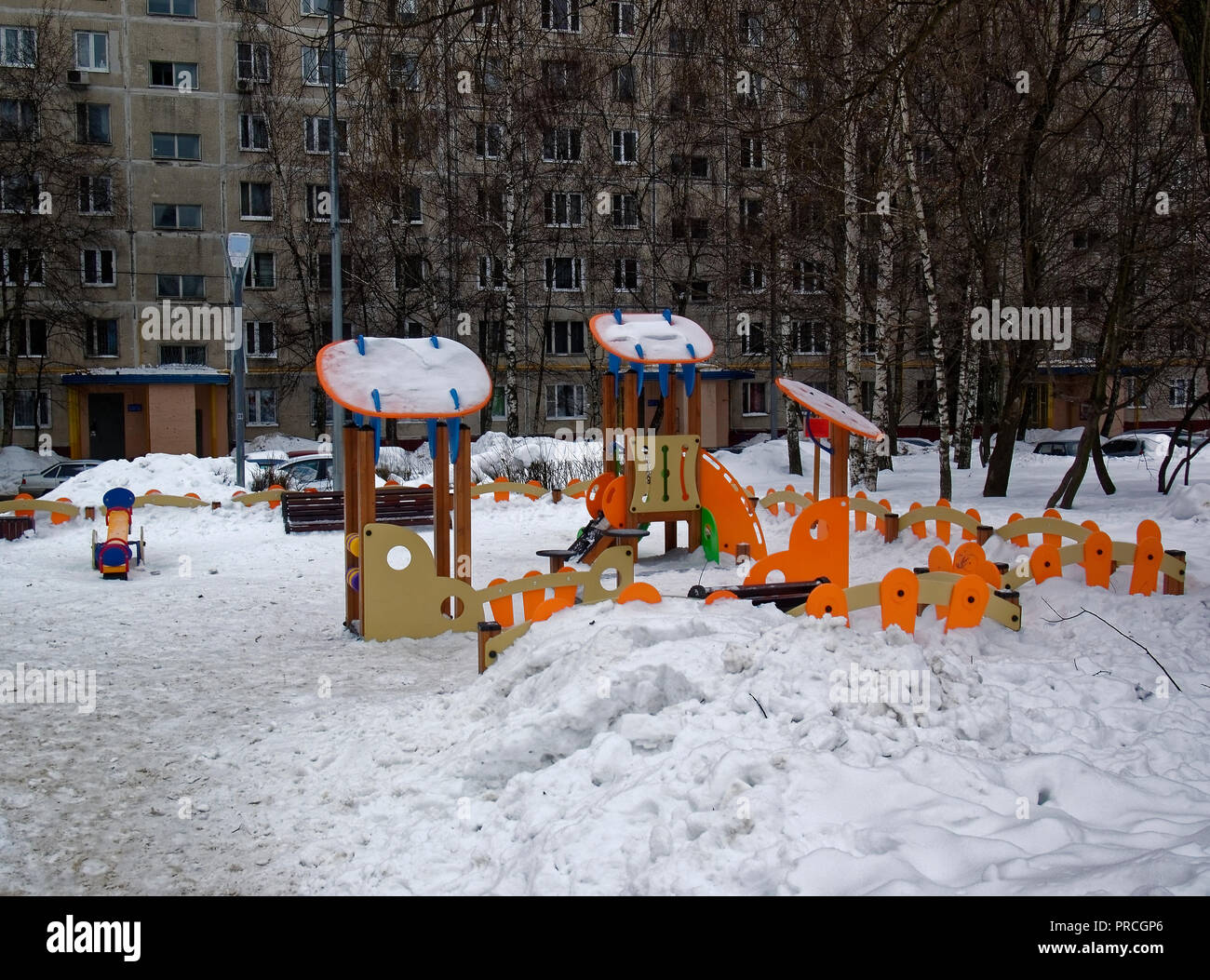 Empty children playground in the snow hi-res stock photography and ...