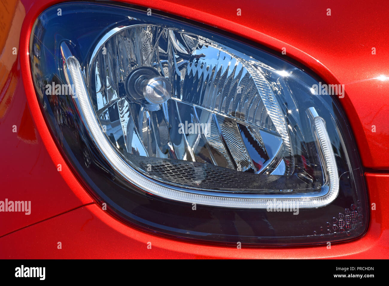 Headlights of a modern car Stock Photo - Alamy