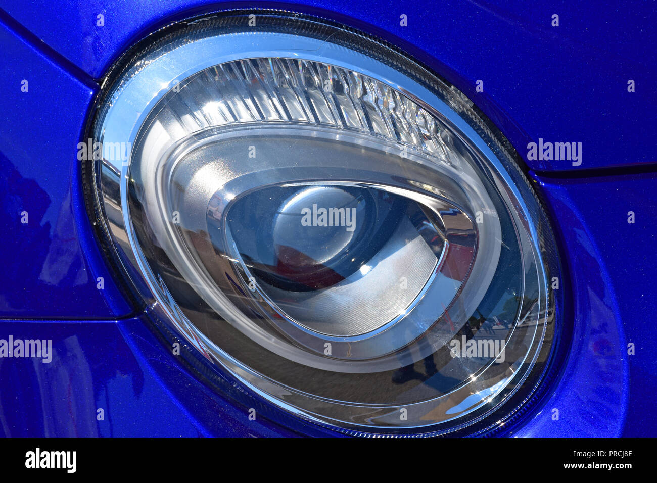 Headlights of modern cars Stock Photo - Alamy