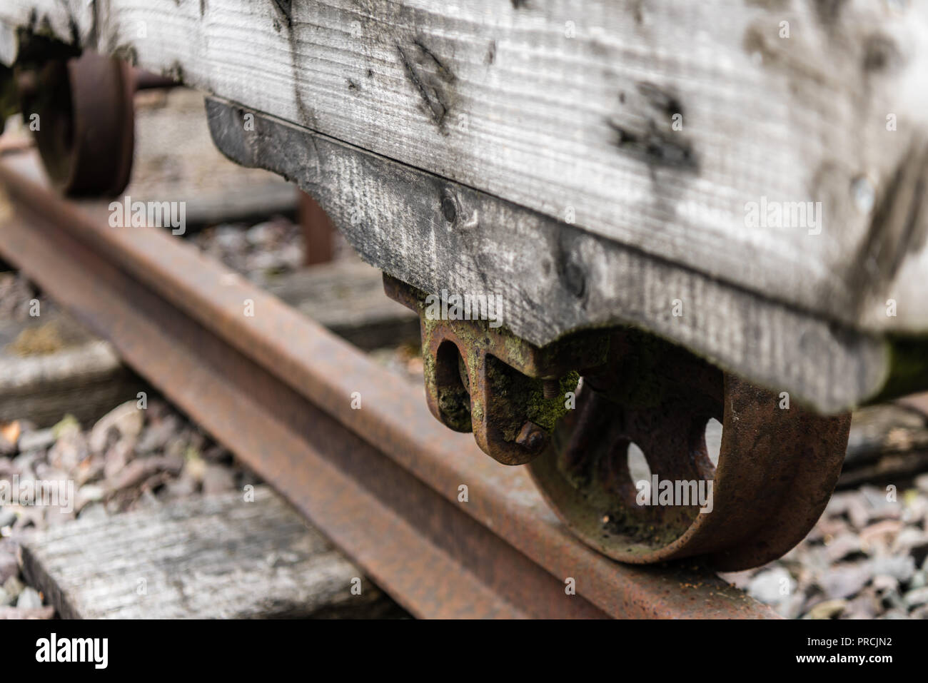 Old wooden cart on rails as used in mining and quarrying during the ...