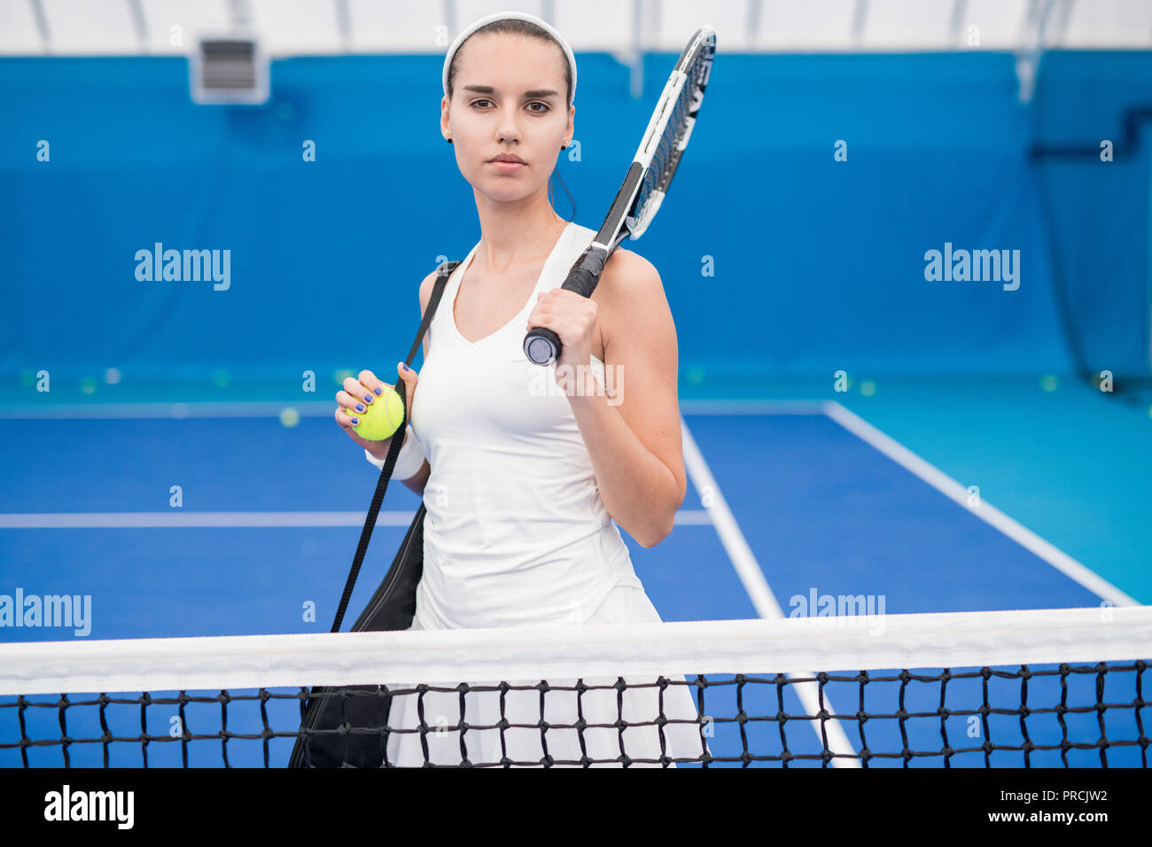 Tennis Player Posing in Court Stock Photo - Alamy