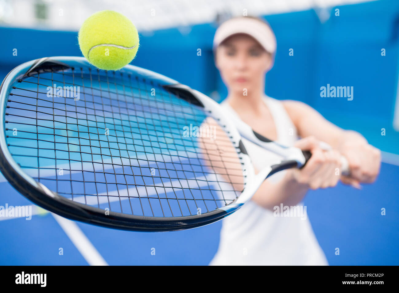 Tennis ball hitting racket close up hi-res stock photography and images ...
