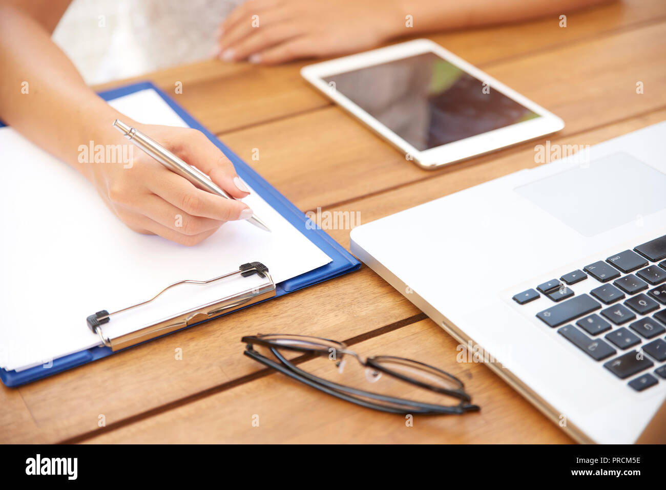 Womans hand using laptop touchpad hi-res stock photography and images ...