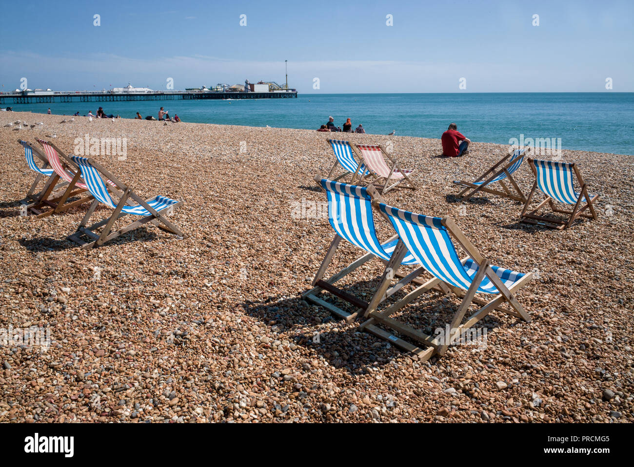 Brighton pier sussex England,seen from pebble beach and sea shore Stock ...