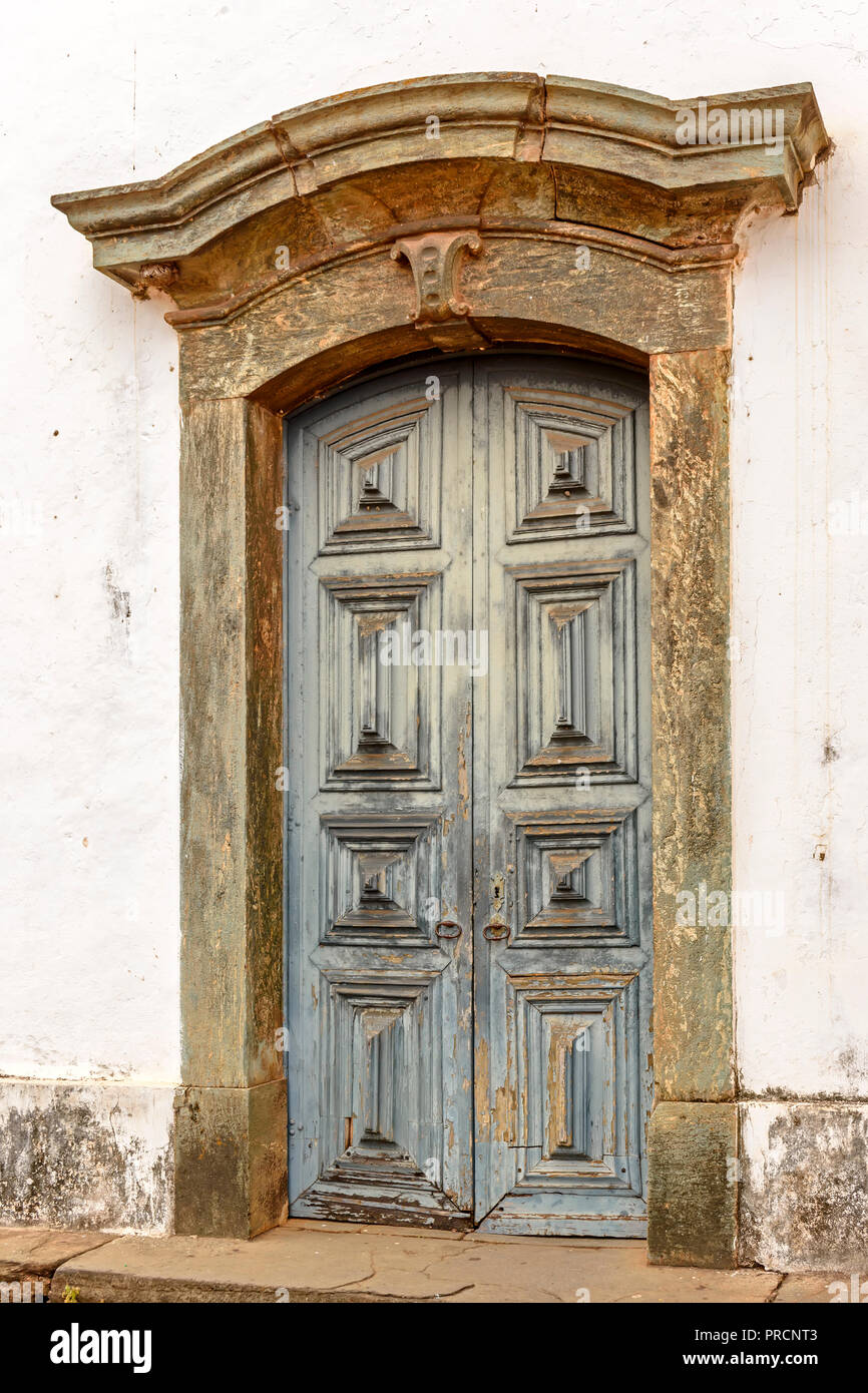 Old and aged historic wooden church door in the city of Sabara, Minas ...