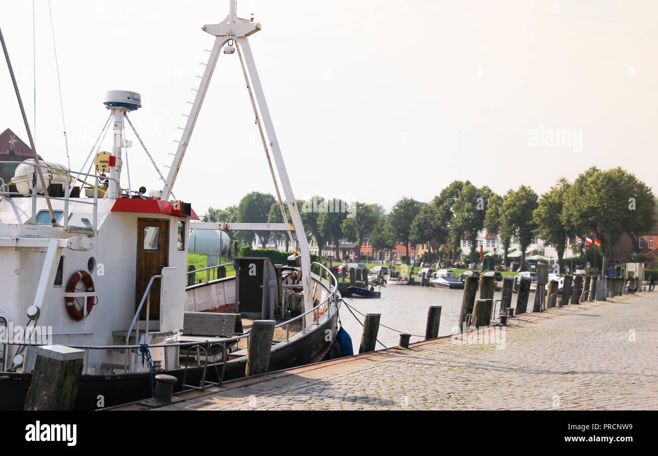 A trawler is in the harbor Stock Photo - Alamy