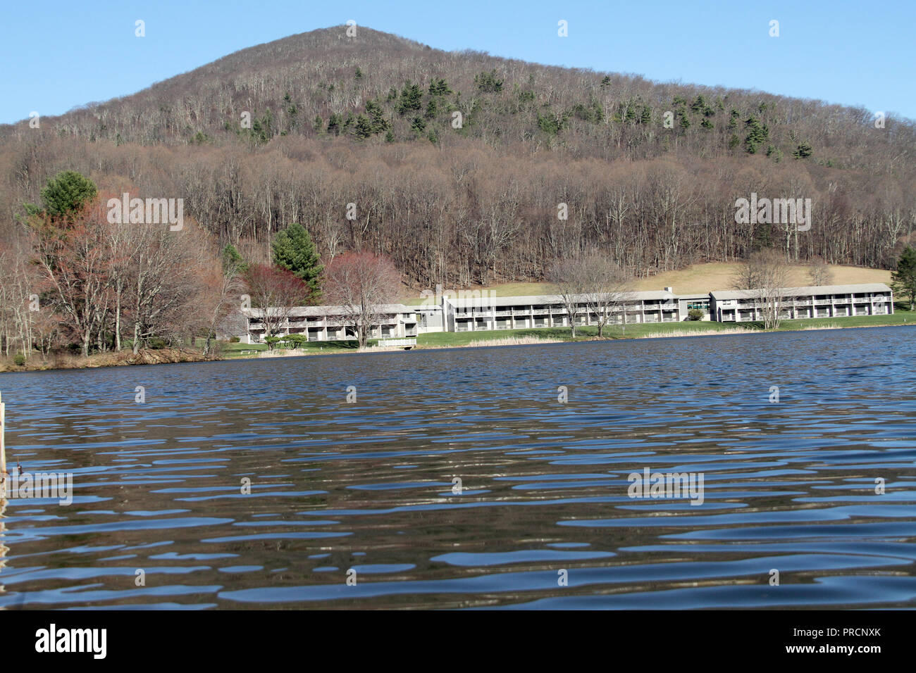 Peaks of Otter lodge at Abbott Lake. Early spring in Virginia's Blue ...