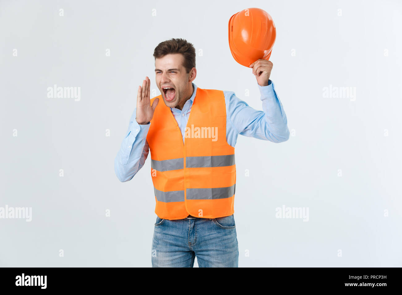 Angry builder or constructor yelling at somebody as fury concept ...